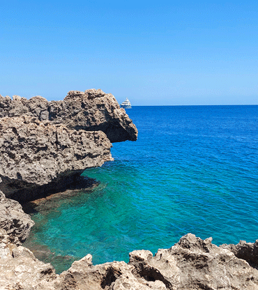 Chasing Sunsets and Sea Caves at Cape Greco - Little Blue Door